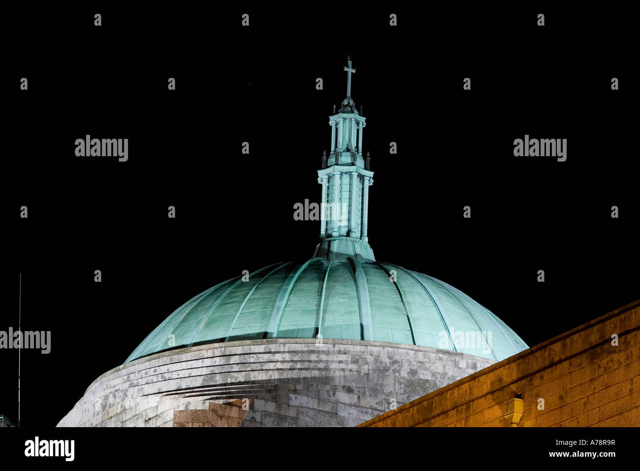 Church Spire at night with copper design which has turned light green ...