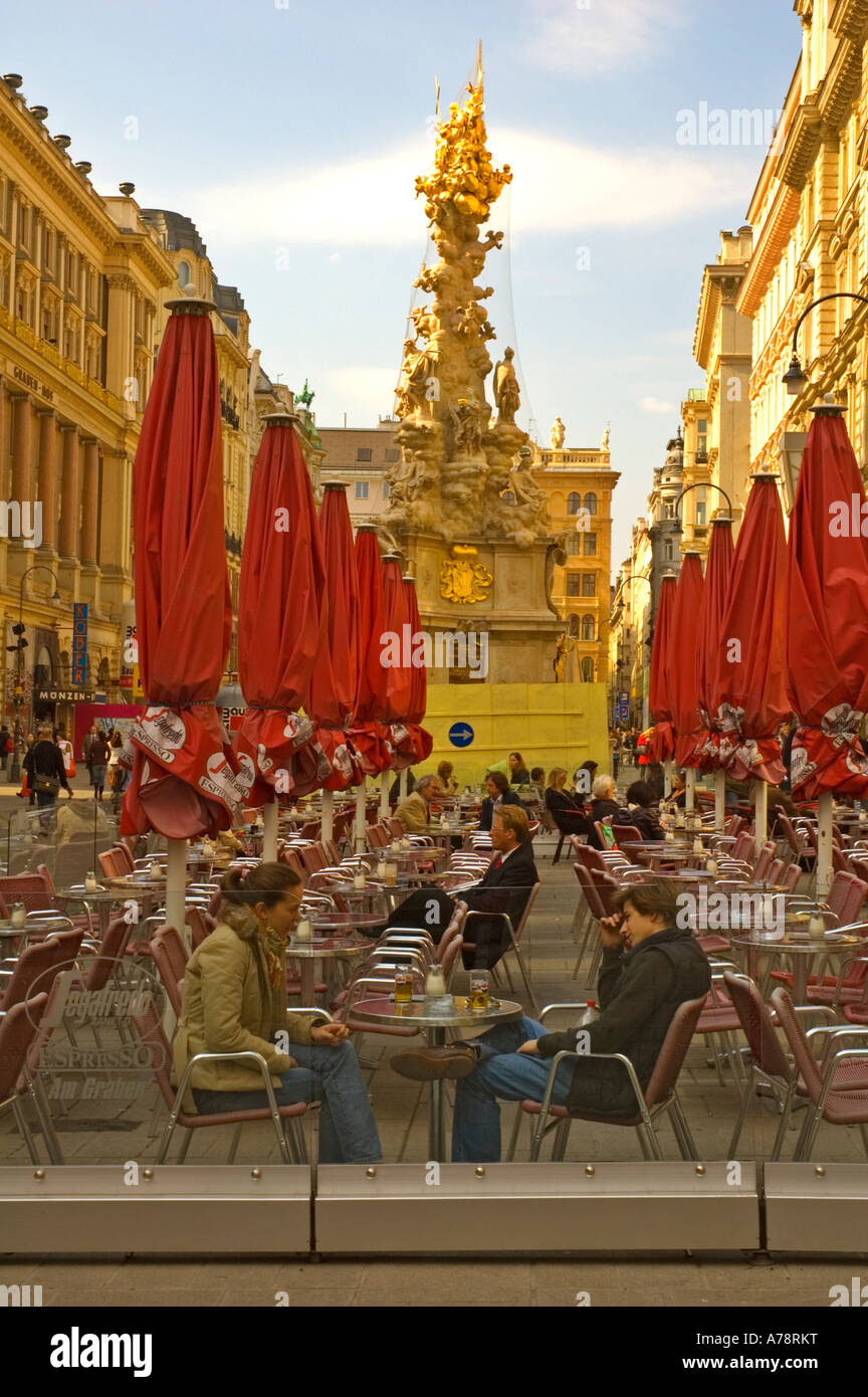 A cafe on Grabben pedestrian street in front of Pest Statue in central ...