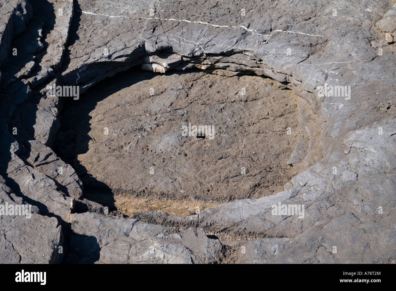 Strange marking on solid rock beside the beach in Donabate strand Stock ...