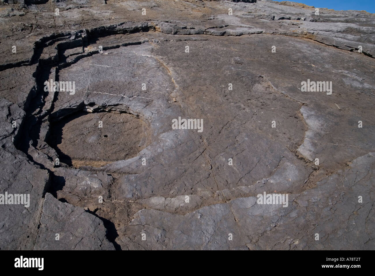 Strange marking on solid rock beside the beach in Donabate strand Stock ...