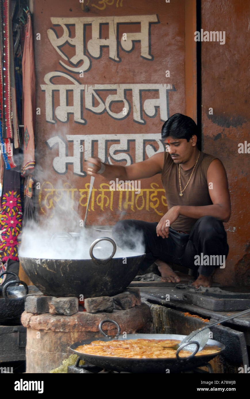 Hindu man cooking in hi-res stock photography and images - Alamy