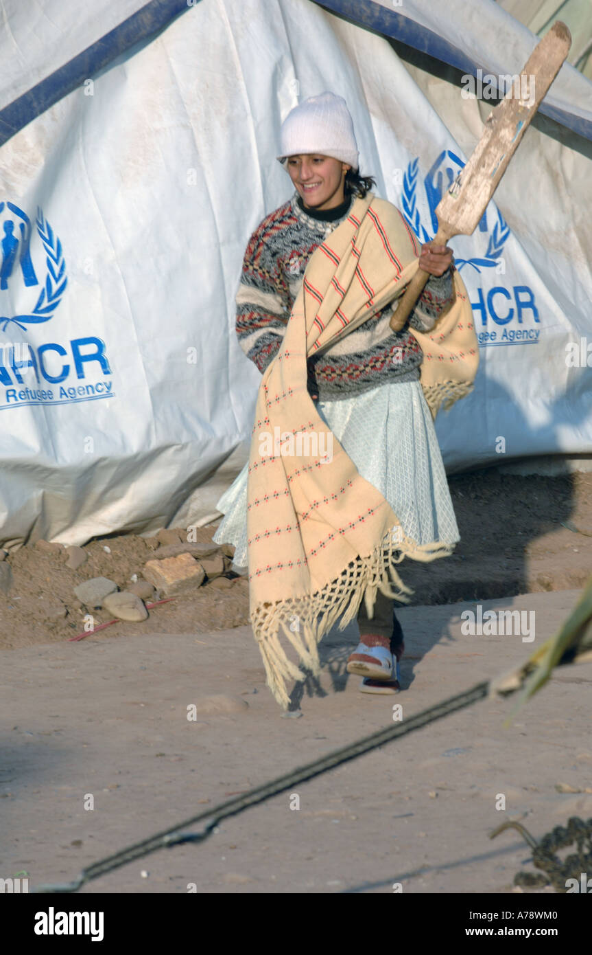 Pakistan girl with cricket bat in the mountain village of Chikar ...