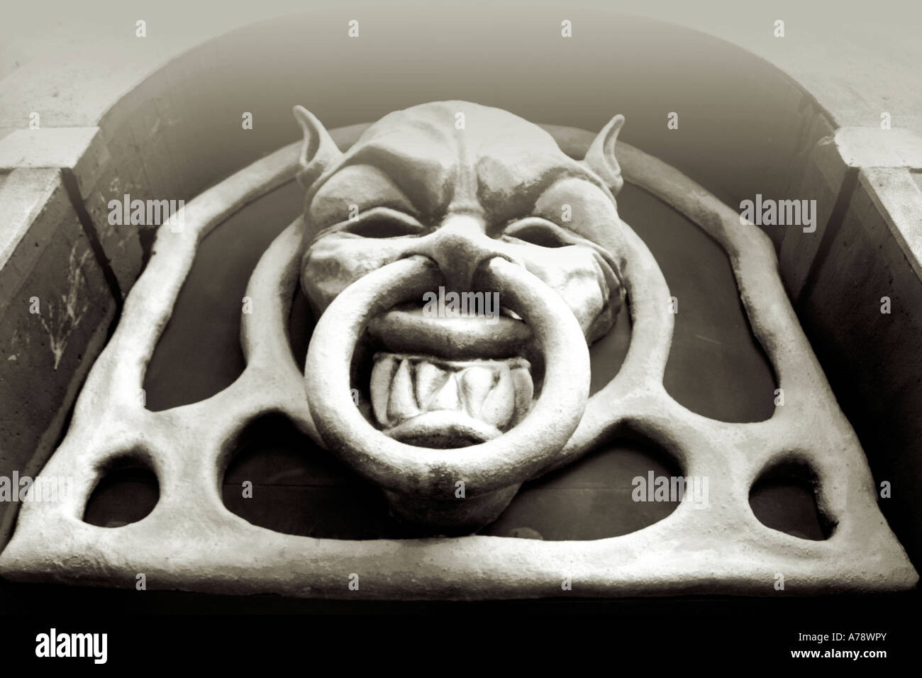 RINGNOSE. Demonic gargoyle figure on wall of the London Dungeon. Image ...