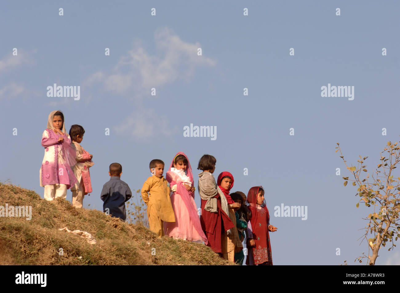 Children play on the mountain life in the village of Chikar Pakistan ...