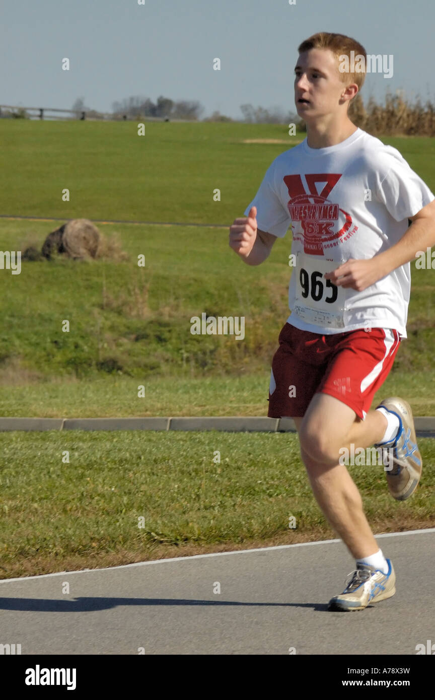 Teenage boy running 5K race Stock Photo - Alamy Teenage boy running 5K race Stock Photo - Alamy