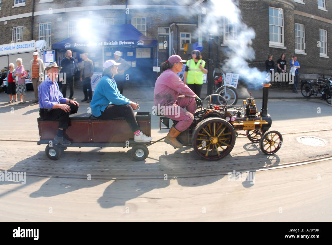 model steam traction engine pulling passengers at a show Stock Photo ...