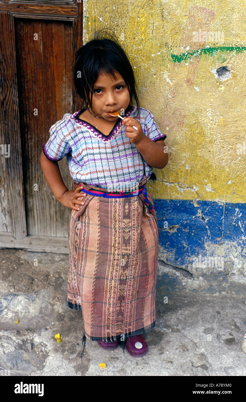 Small Indian girl with a lollipop Stock Photo - Alamy