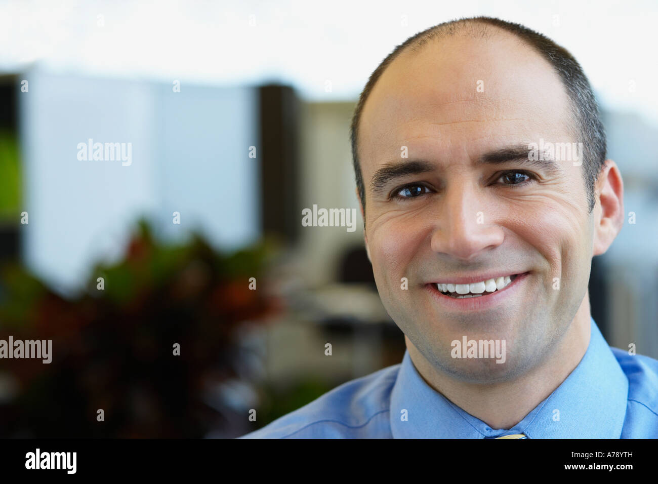 Office worker smiling Stock Photo - Alamy