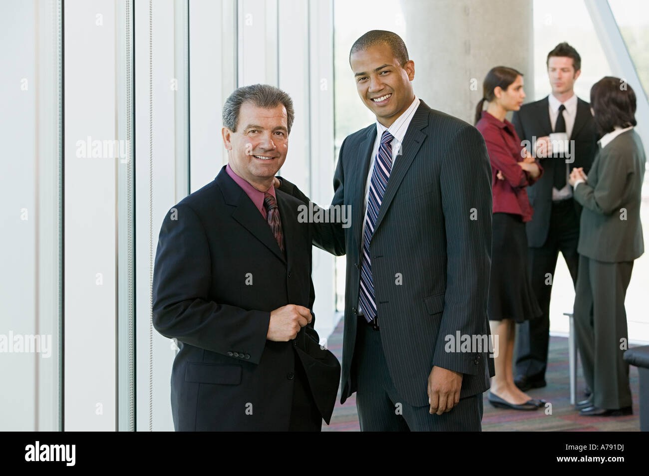 Team three businessmen two white hi-res stock photography and images ...
