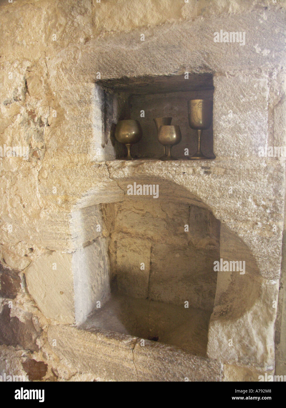 Chalice goblets in chapel alcove Orford castle Suffolk England Stock ...