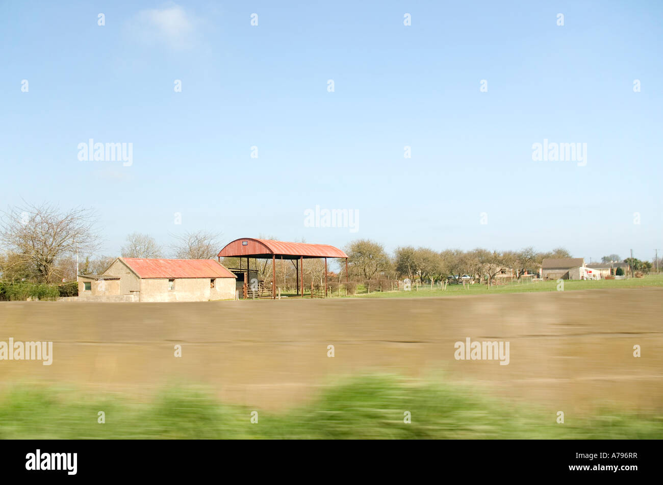 Driving Past a Farmhouse Stock Photo - Alamy