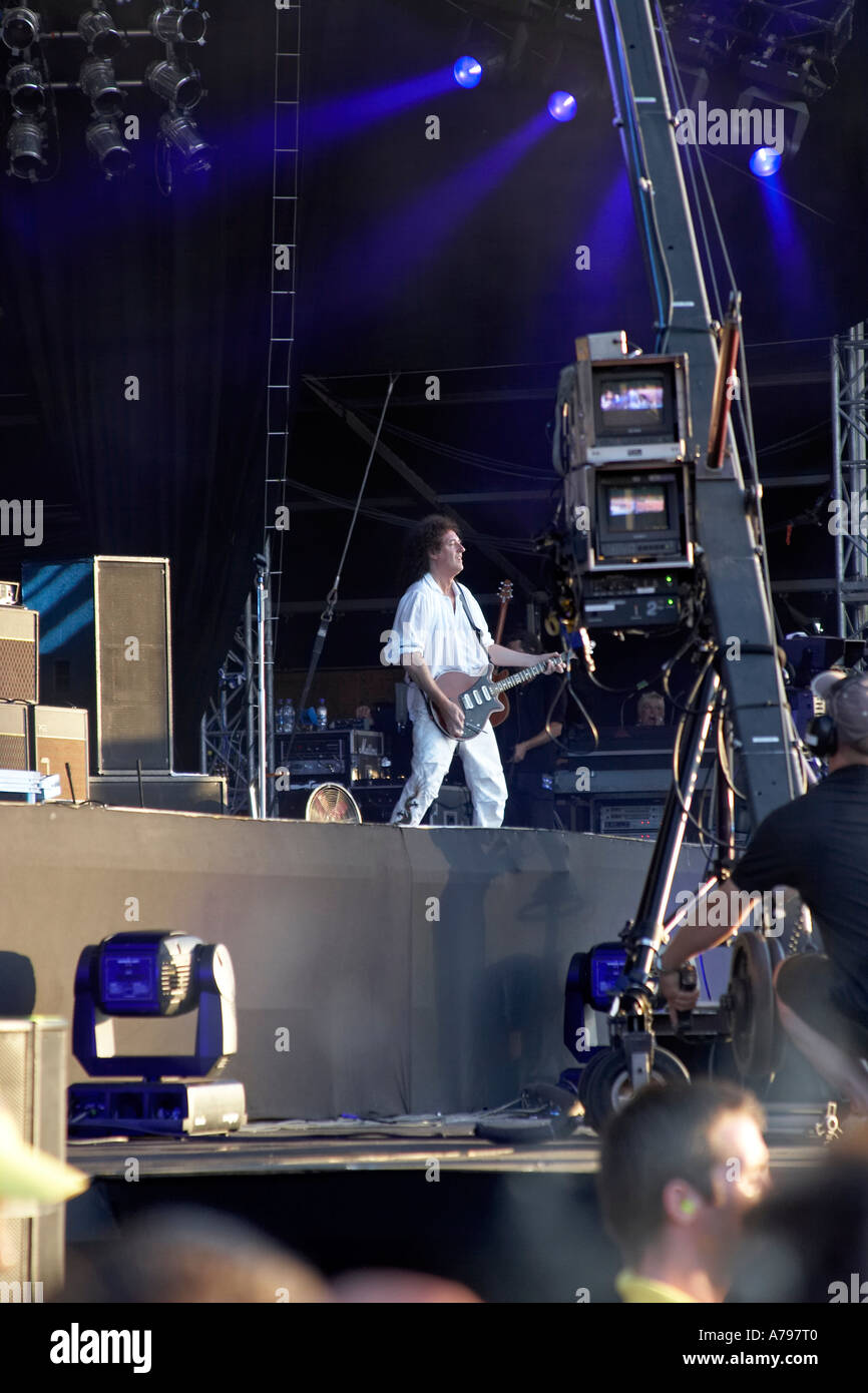 Queen concert with guitarist Brian May and boom camera operator in Hyde ...
