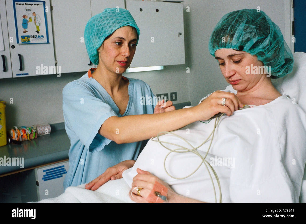 Nurse applying monitoring Stock Photo - Alamy