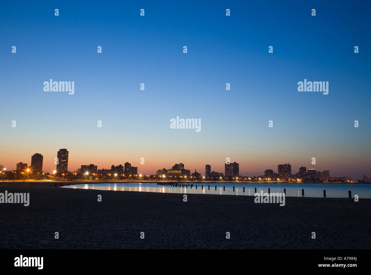 CHICAGO Illinois Shoreline at North Avenue Beach at night highrises ...