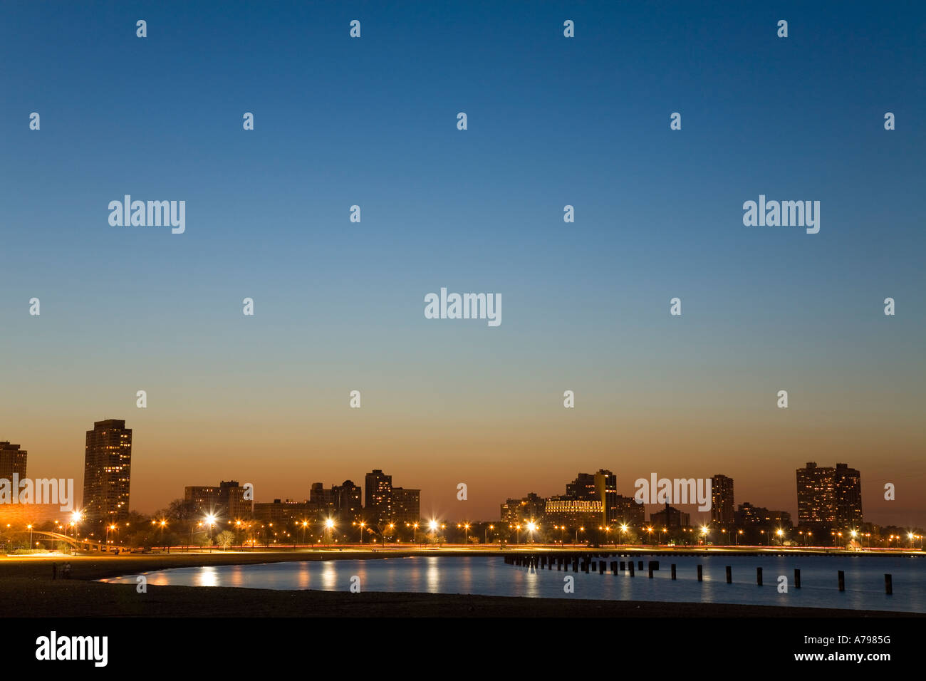 CHICAGO Illinois Shoreline at North Avenue Beach at night highrises ...