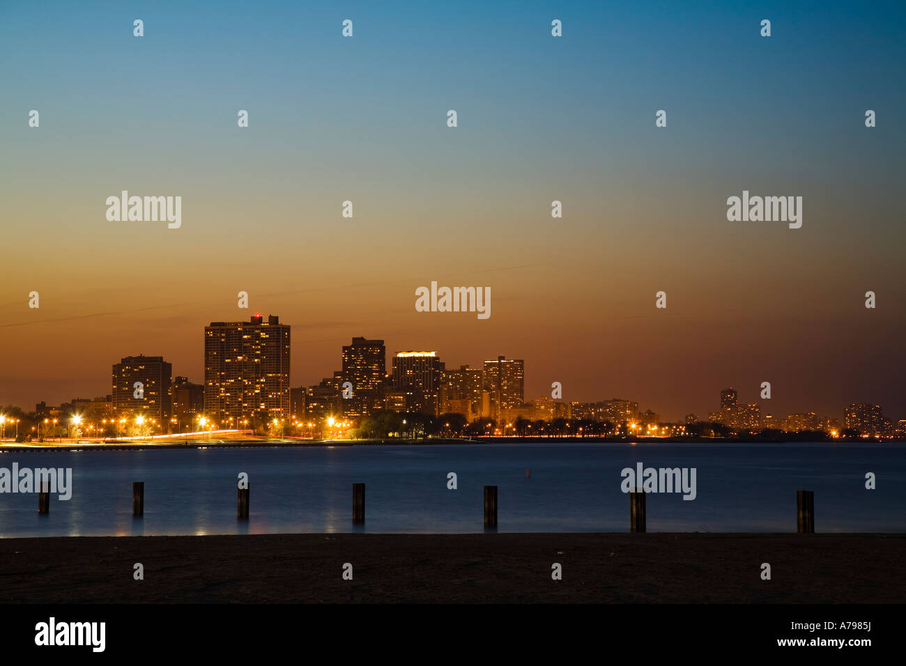 CHICAGO Illinois Shoreline at North Avenue Beach at night highrises ...