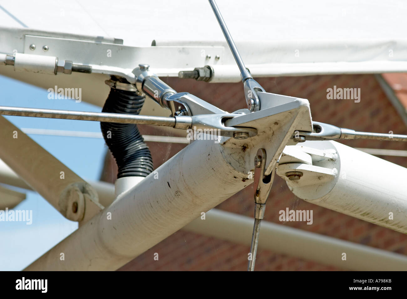 Tensile walkway canopy structure spar detail with cable cleats at ...