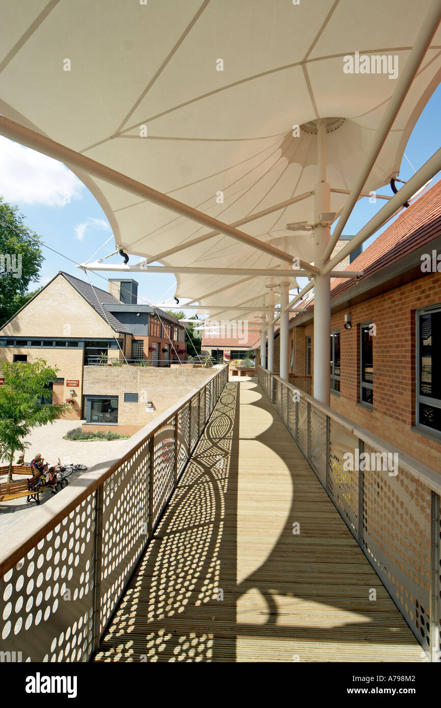 Tensile walkway canopy structure at Papworth Village Centre ...