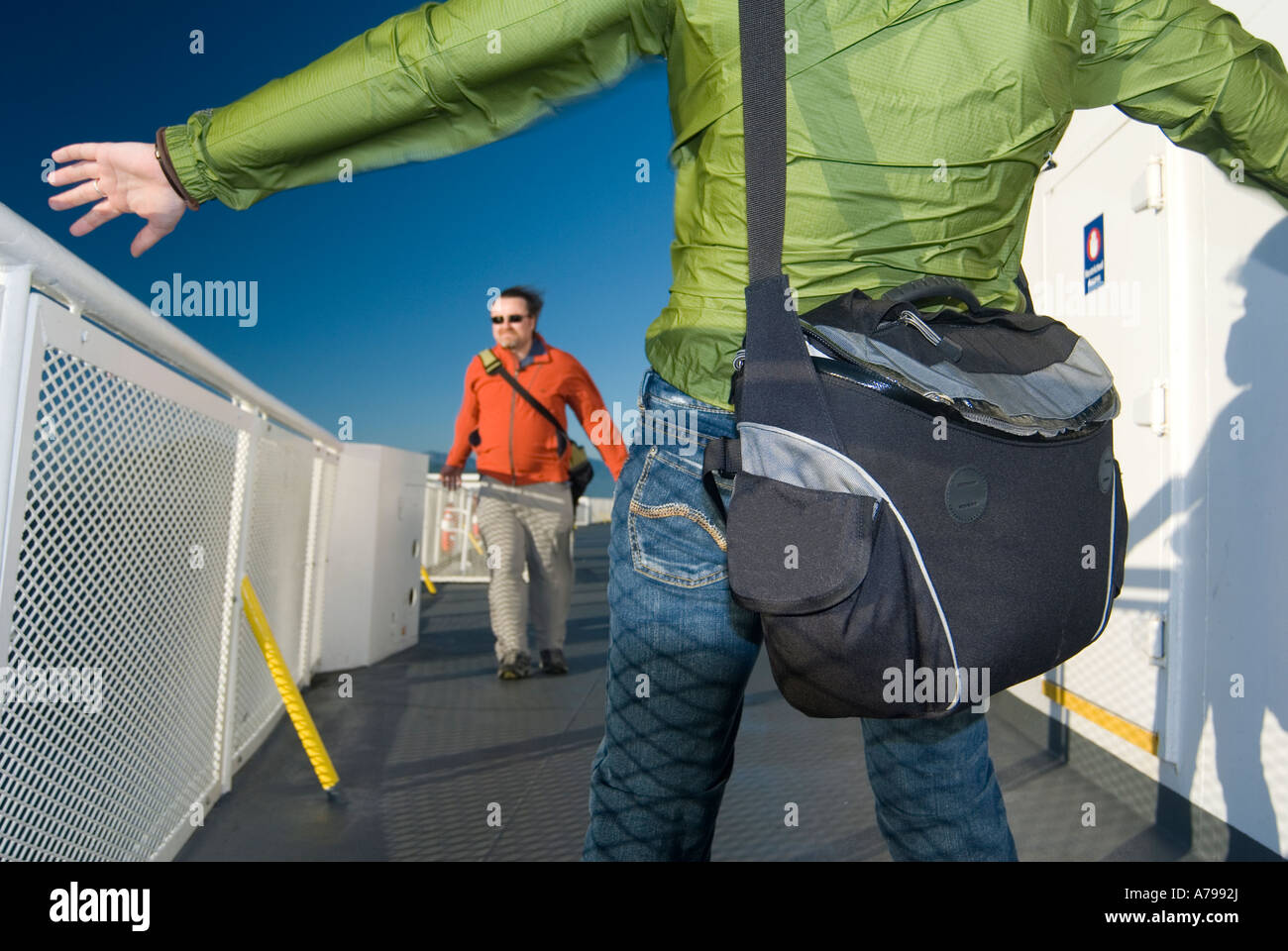 Commuters enjoy a windy day on a BC Ferry Strait of Georgia Vancouver ...