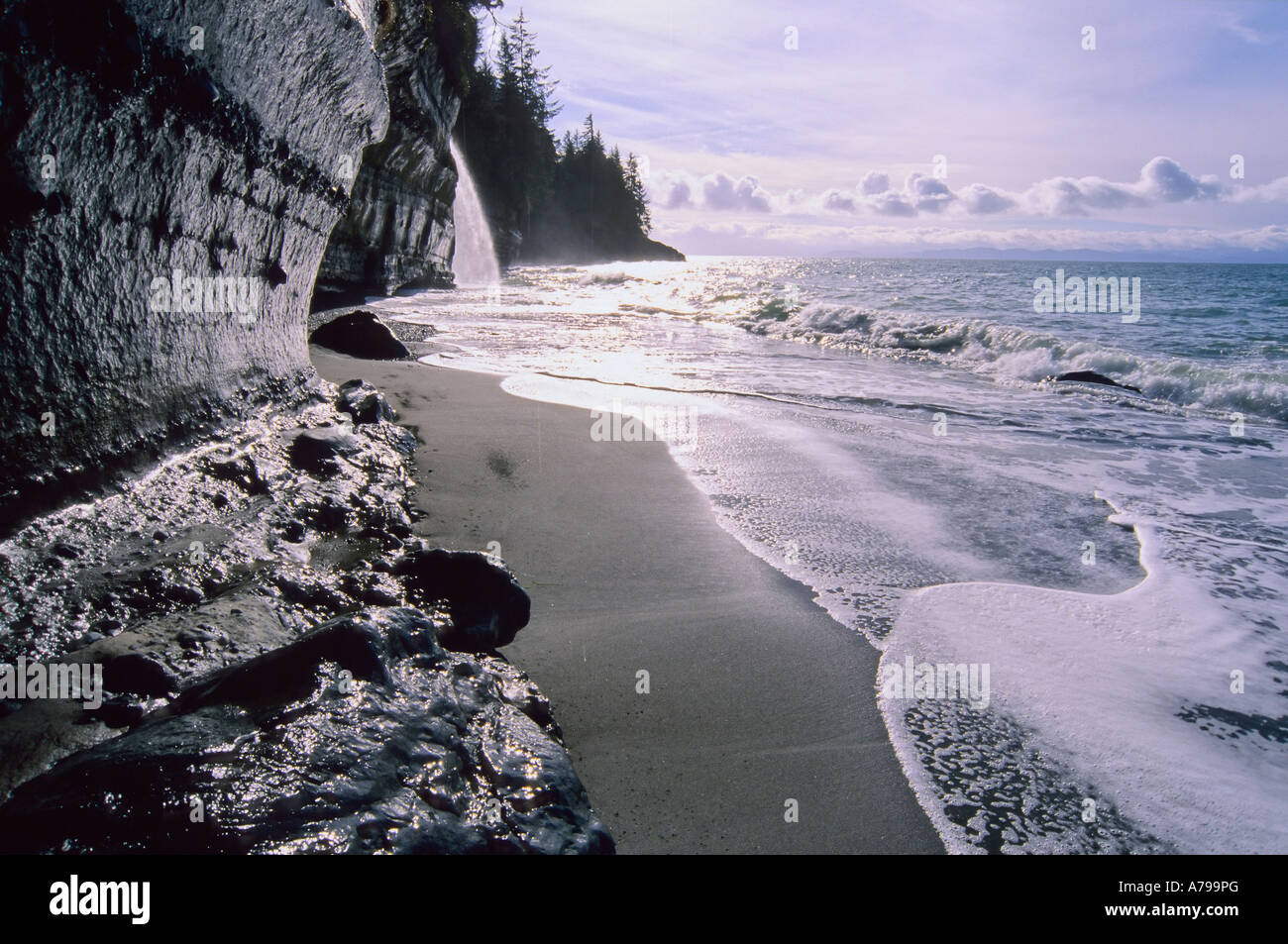 Sandstone cliffs and Waterfall at Mystic Beach near Jordan River ...
