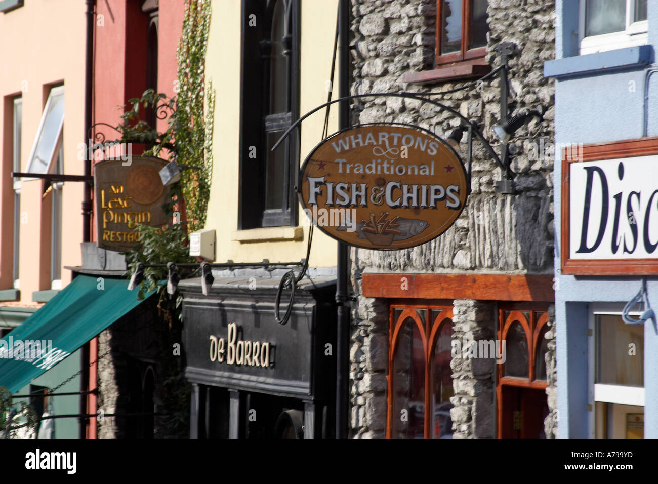 Pastel coloured shops houses pubs and restaurants in pretty attractive ...