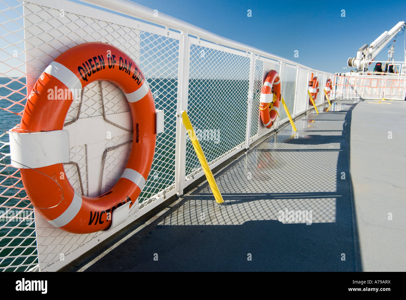 A freshly painted railing glows in the sunshine on a BC Ferry Stock ...