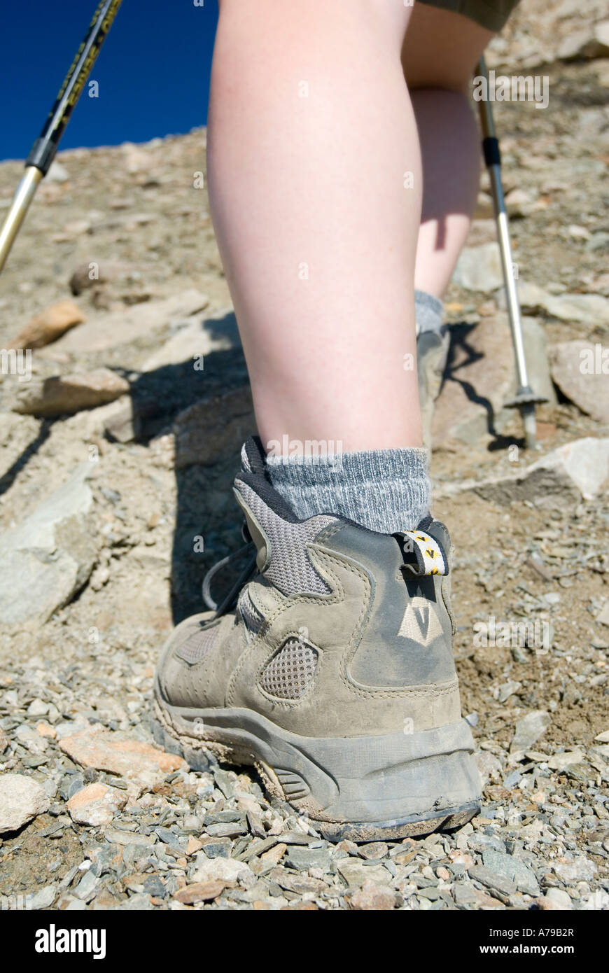 A close up of a woman s hiking boot on the way up to the Notch on the ...