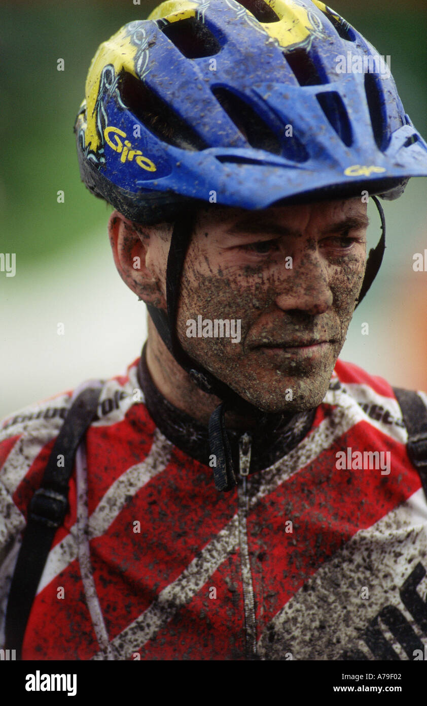 Muddy face of mountain bike racer Stock Photo - Alamy