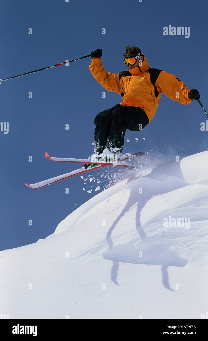 Blue sky skier Stock Photo - Alamy