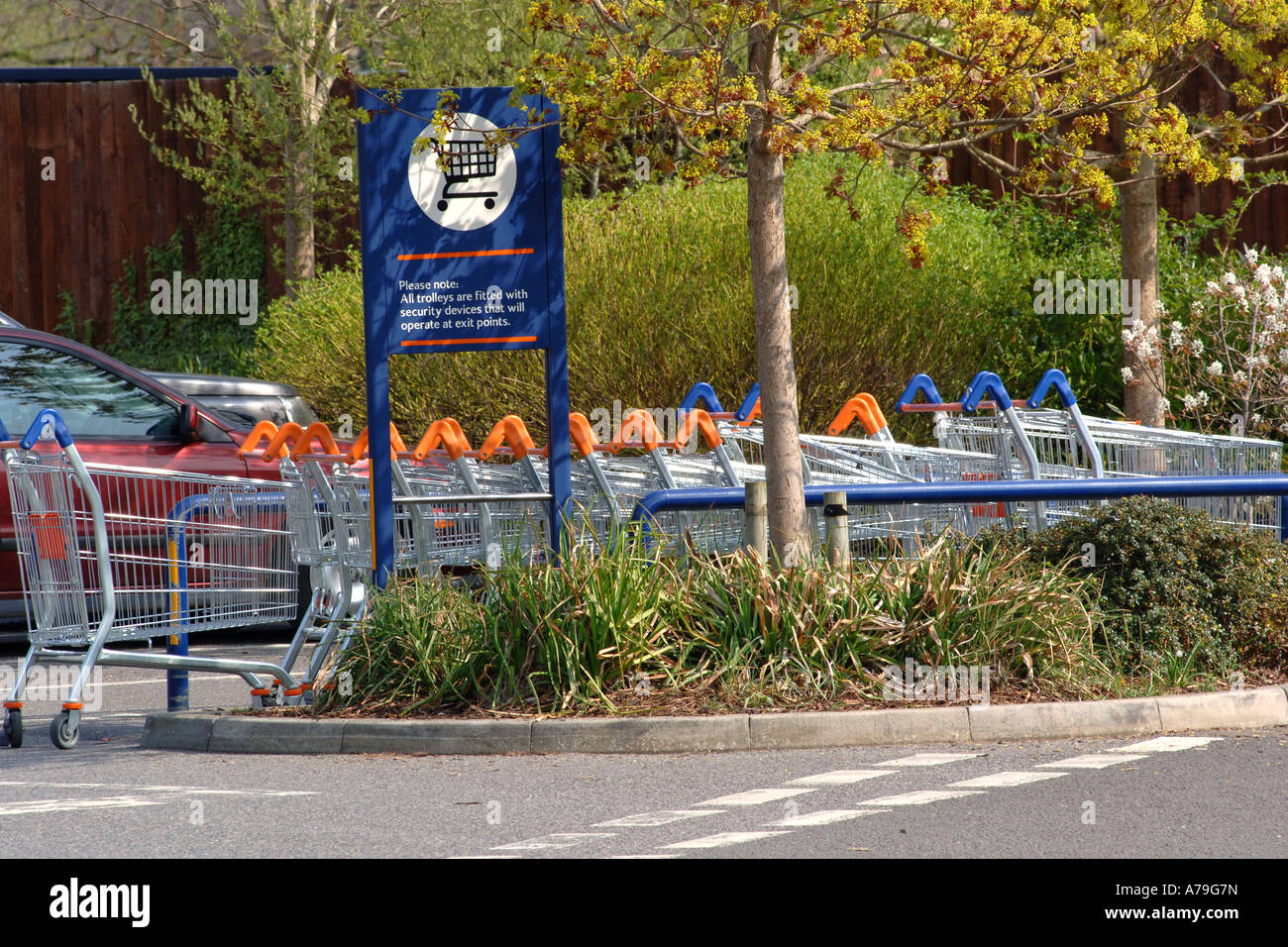 Shopping cart drop off and collection point in a car park Stock Photo ...