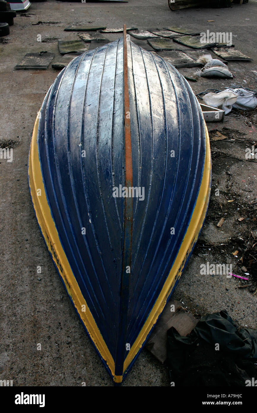 The Dingy Sarah vertical: A freshly painted yellow and blue traditional ...