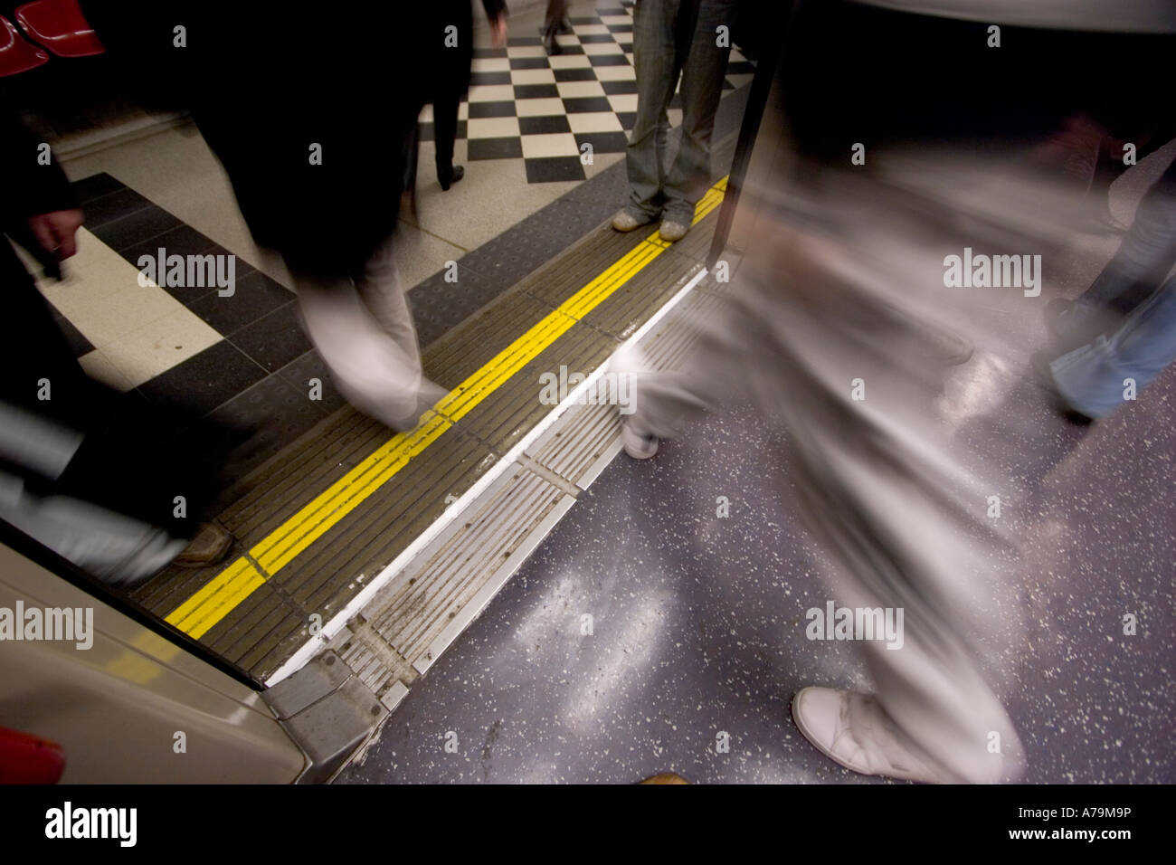 passengers disembarking leaving tube train on london underground ...