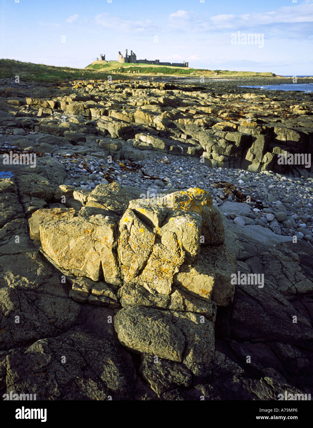 View of Dunstanburgh Castle from the beach near Craster on the ...