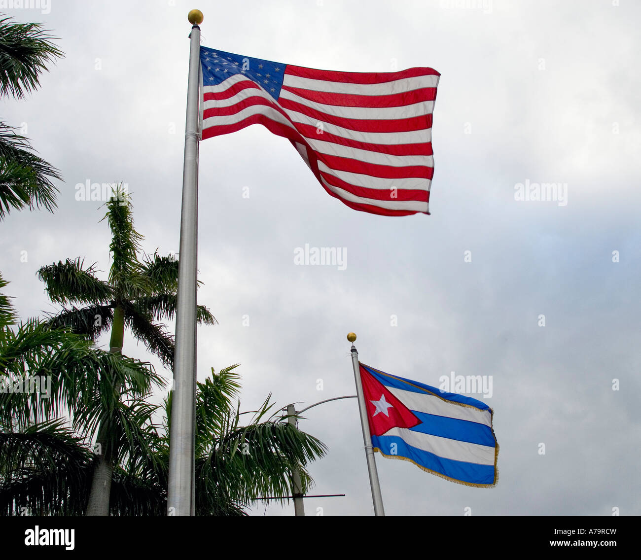 American and Cuban flags flying in the Little Havana section of Miami ...