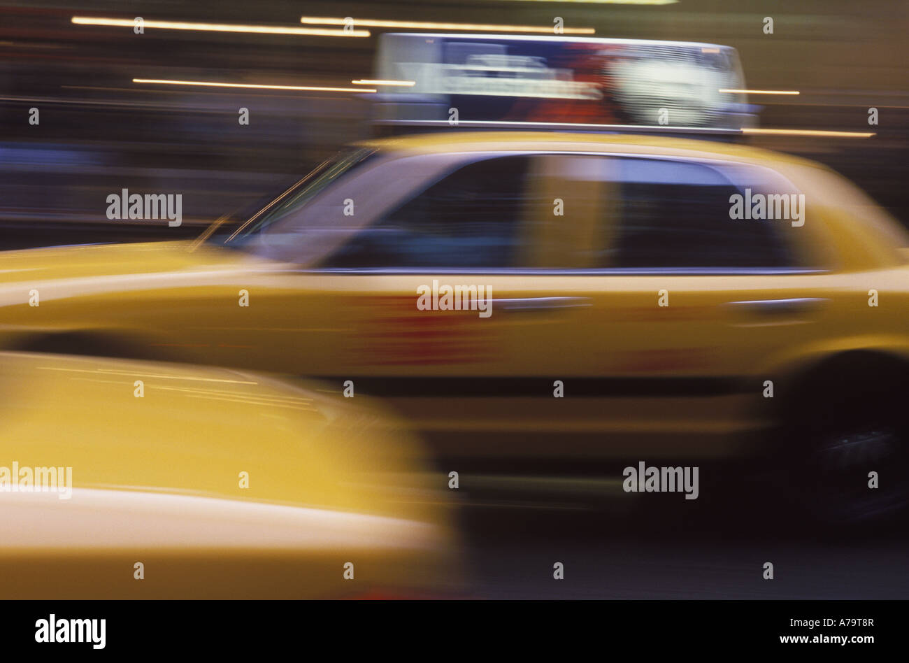 Moving taxi in traffic Stock Photo - Alamy