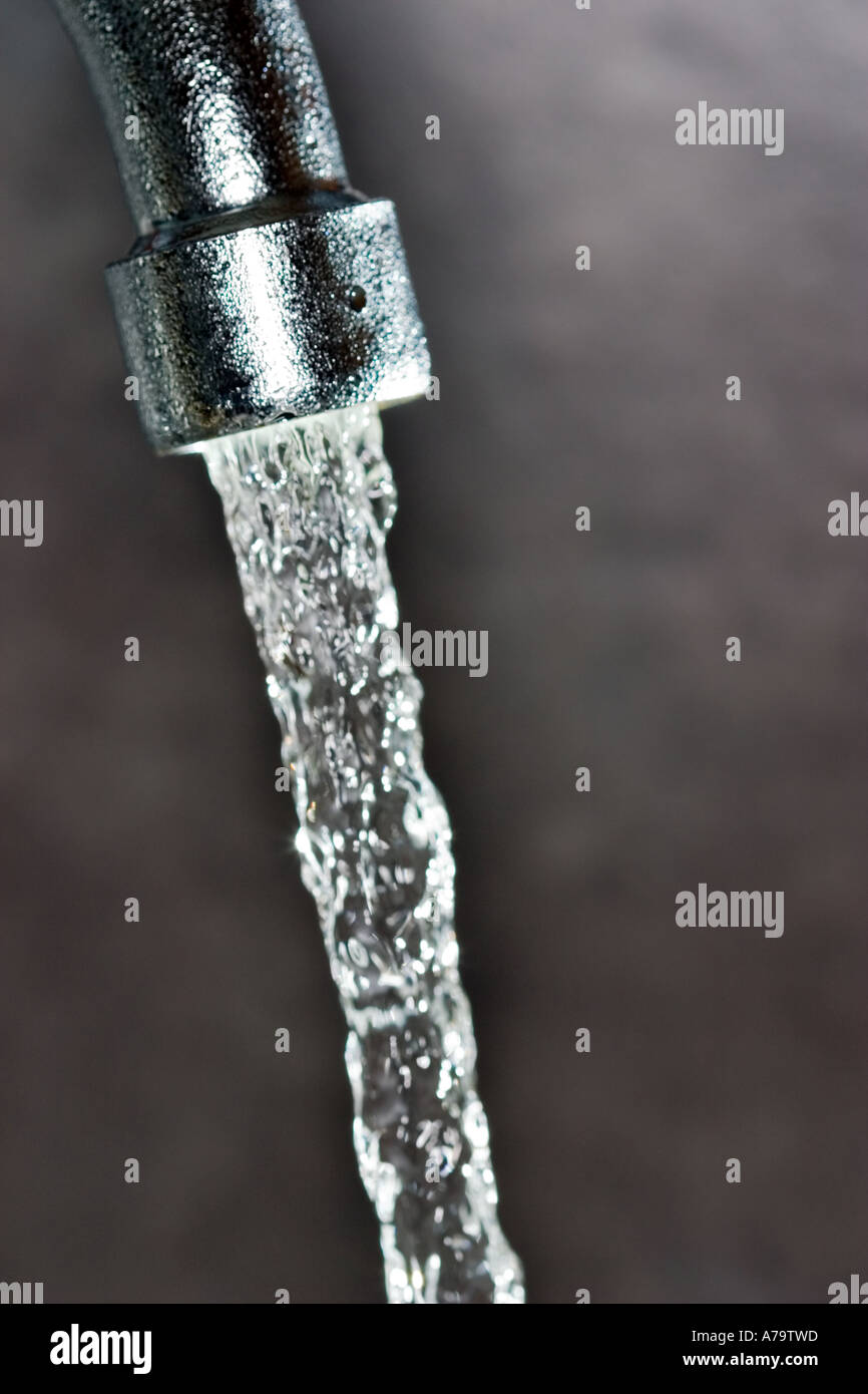 fresh running water tap faucet Stock Photo - Alamy