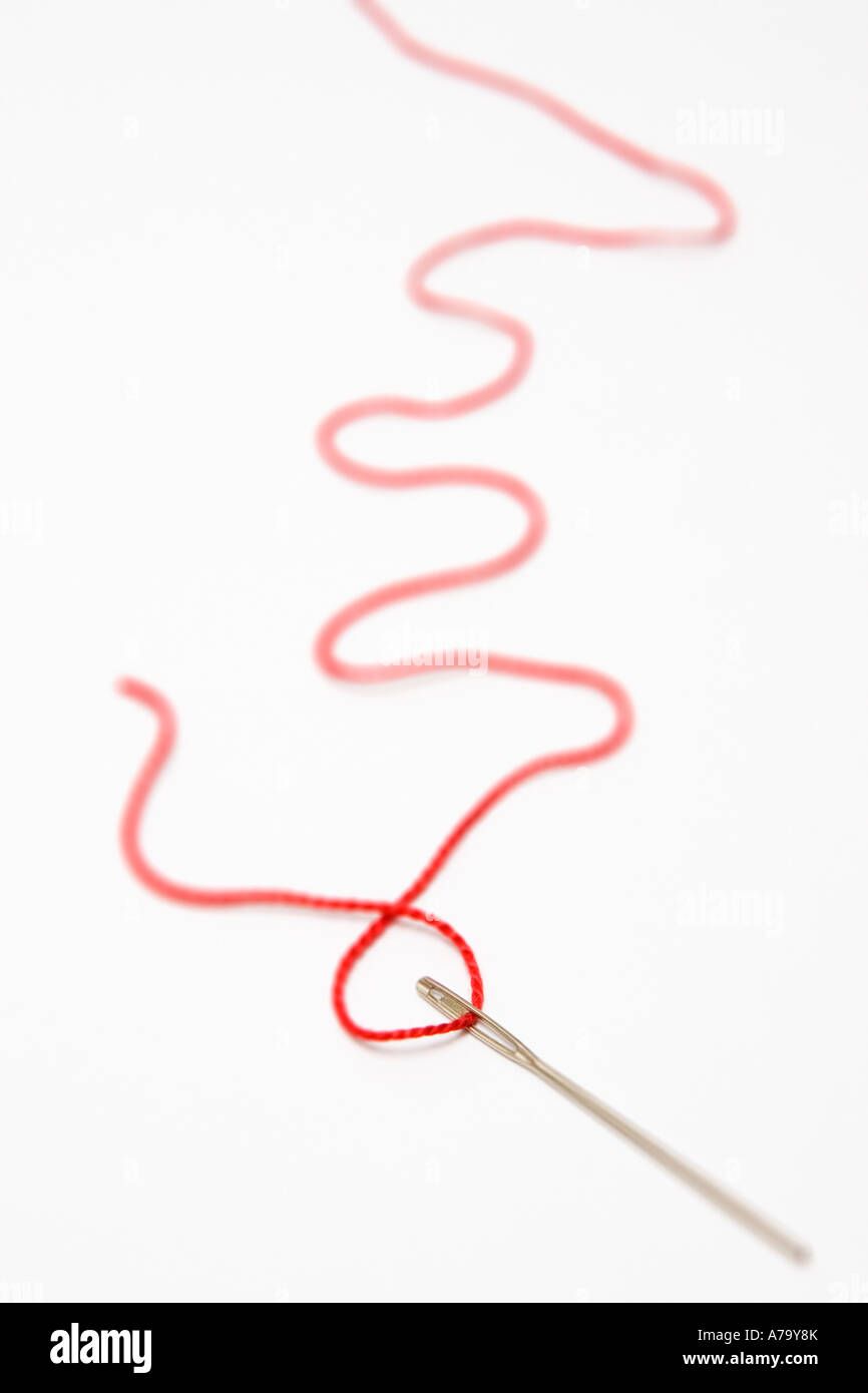 Needle and thread Stock Photo - Alamy