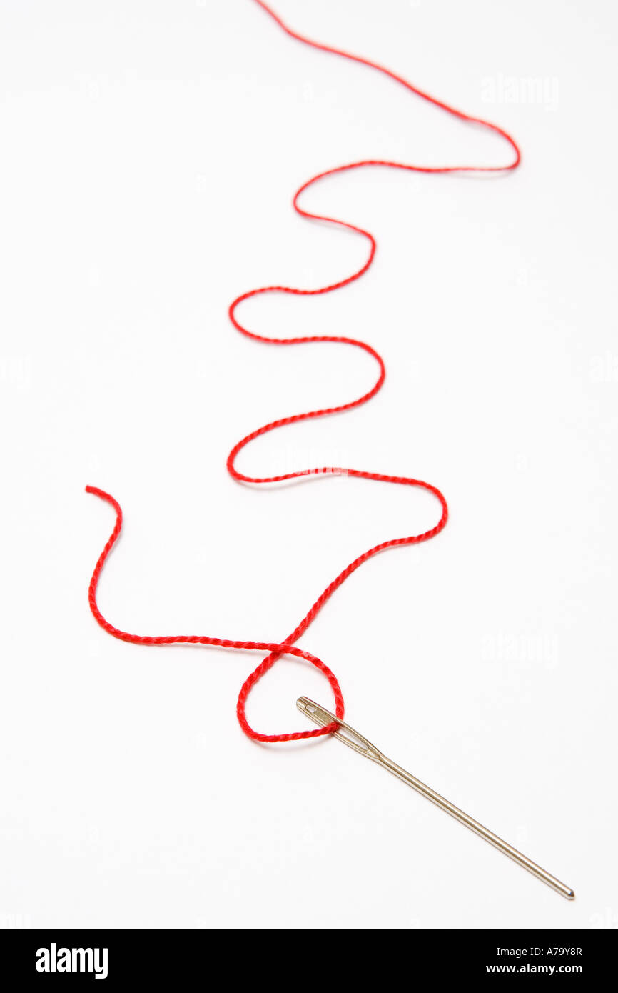 Needle and thread Stock Photo - Alamy