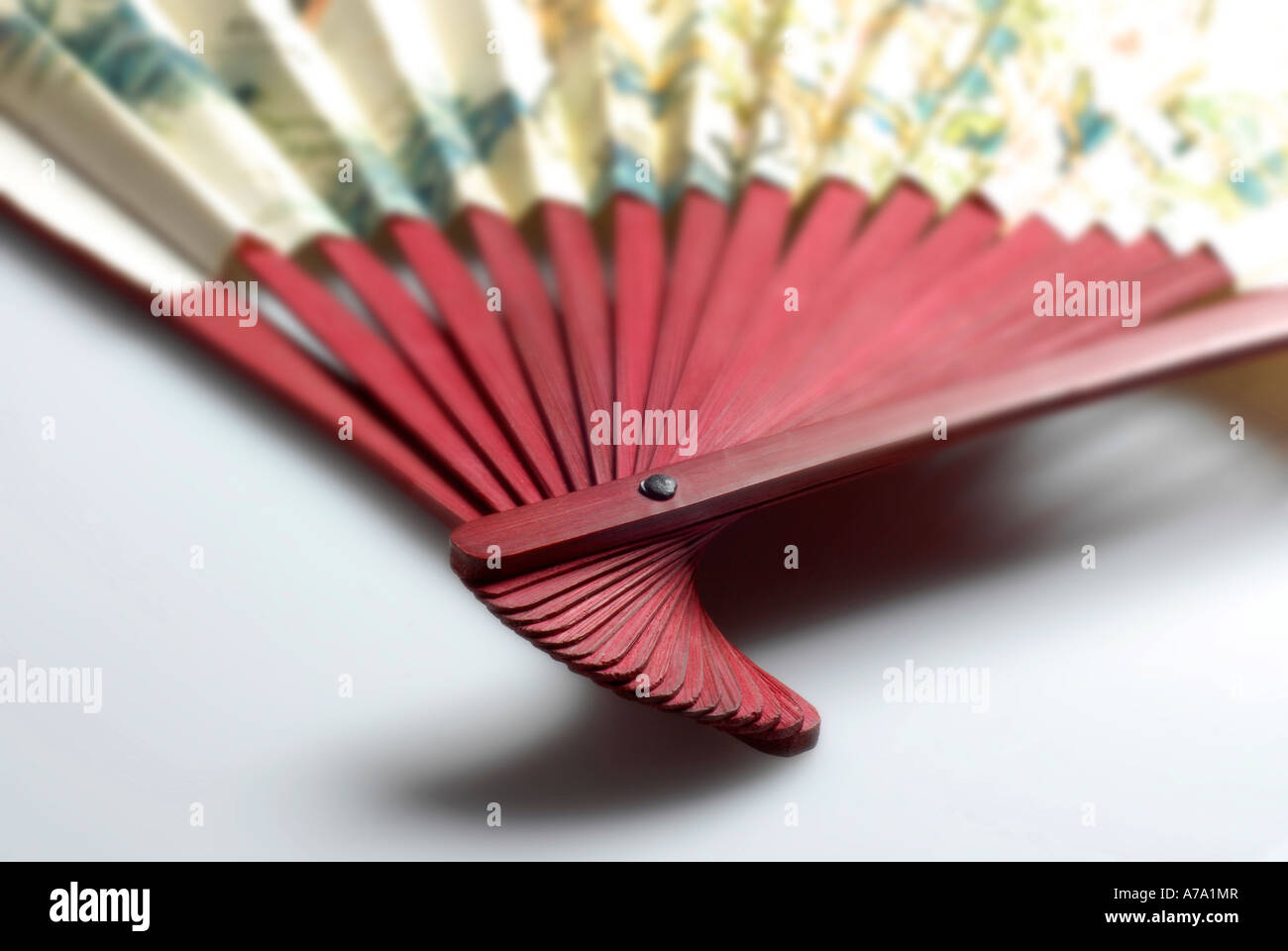 Folding hand fan Stock Photo - Alamy