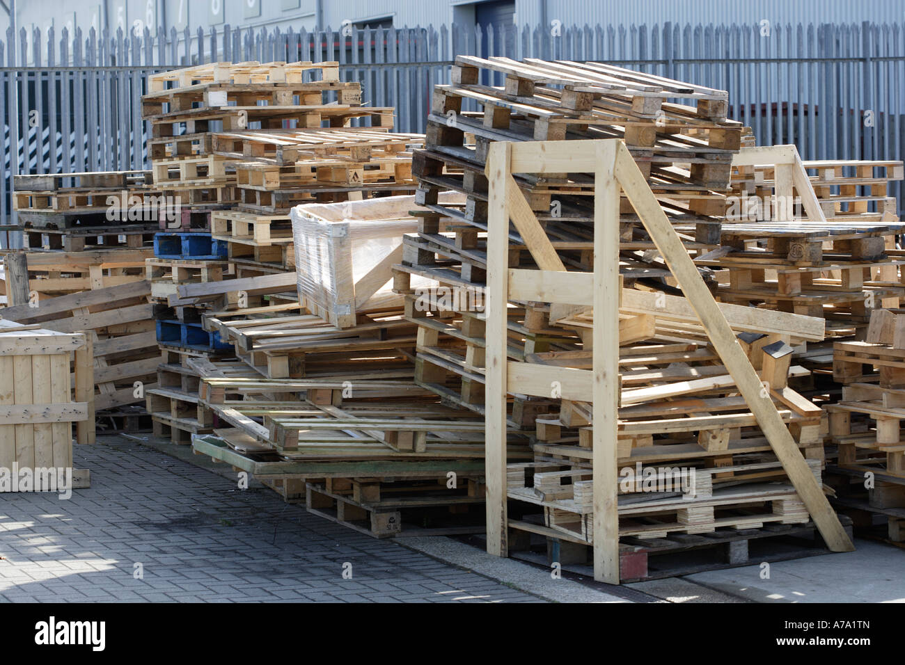 Pallets stacked up Stock Photo - Alamy