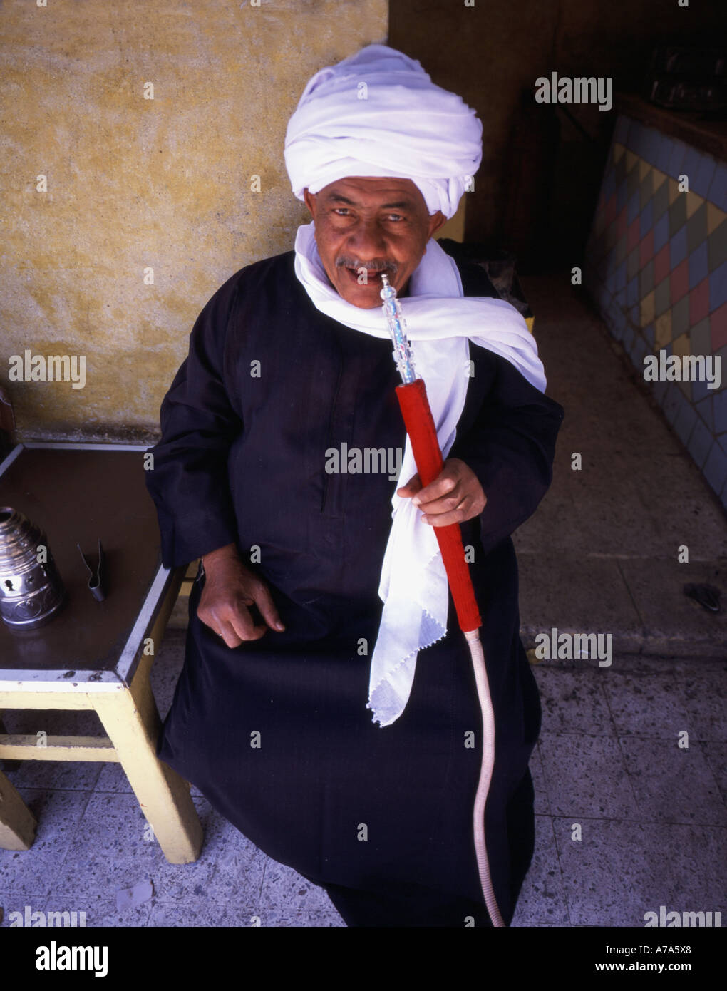 Man smoking hubble bubble pipe hi-res stock photography and images - Alamy