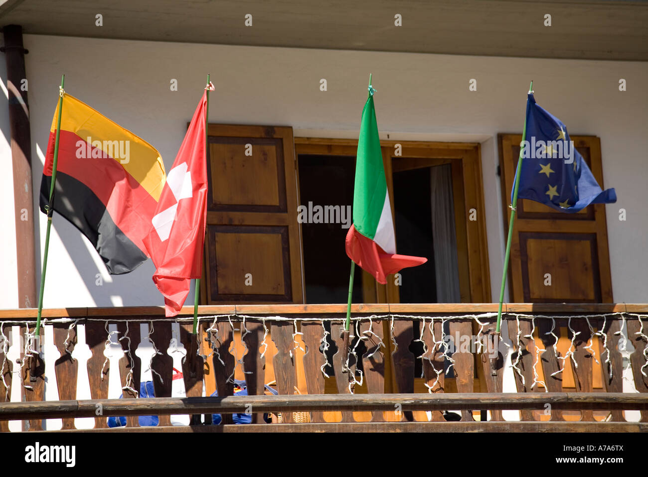 Hotel balcony displaying different European flags Stock Photo - Alamy