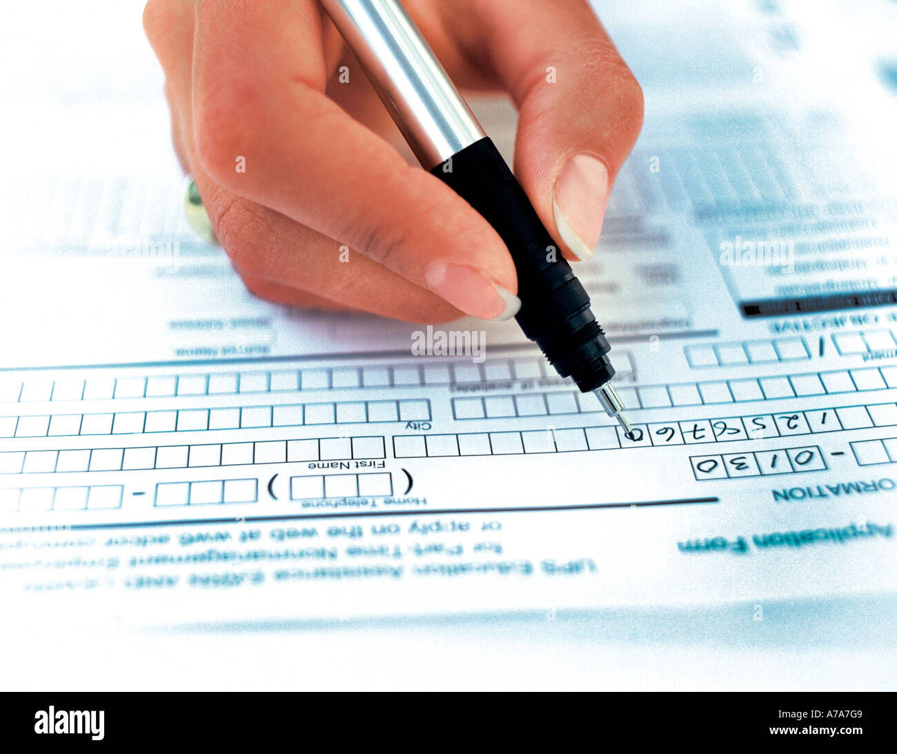 contract writing, hands and paper, pen, form Stock Photo - Alamy