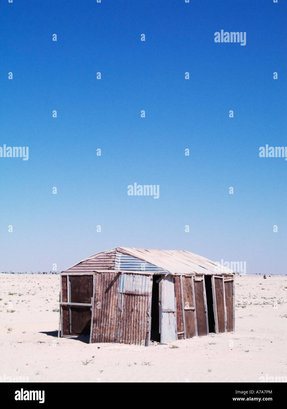 abandoned shack in the white sands of the Sahara Desert, n Mauritania ...