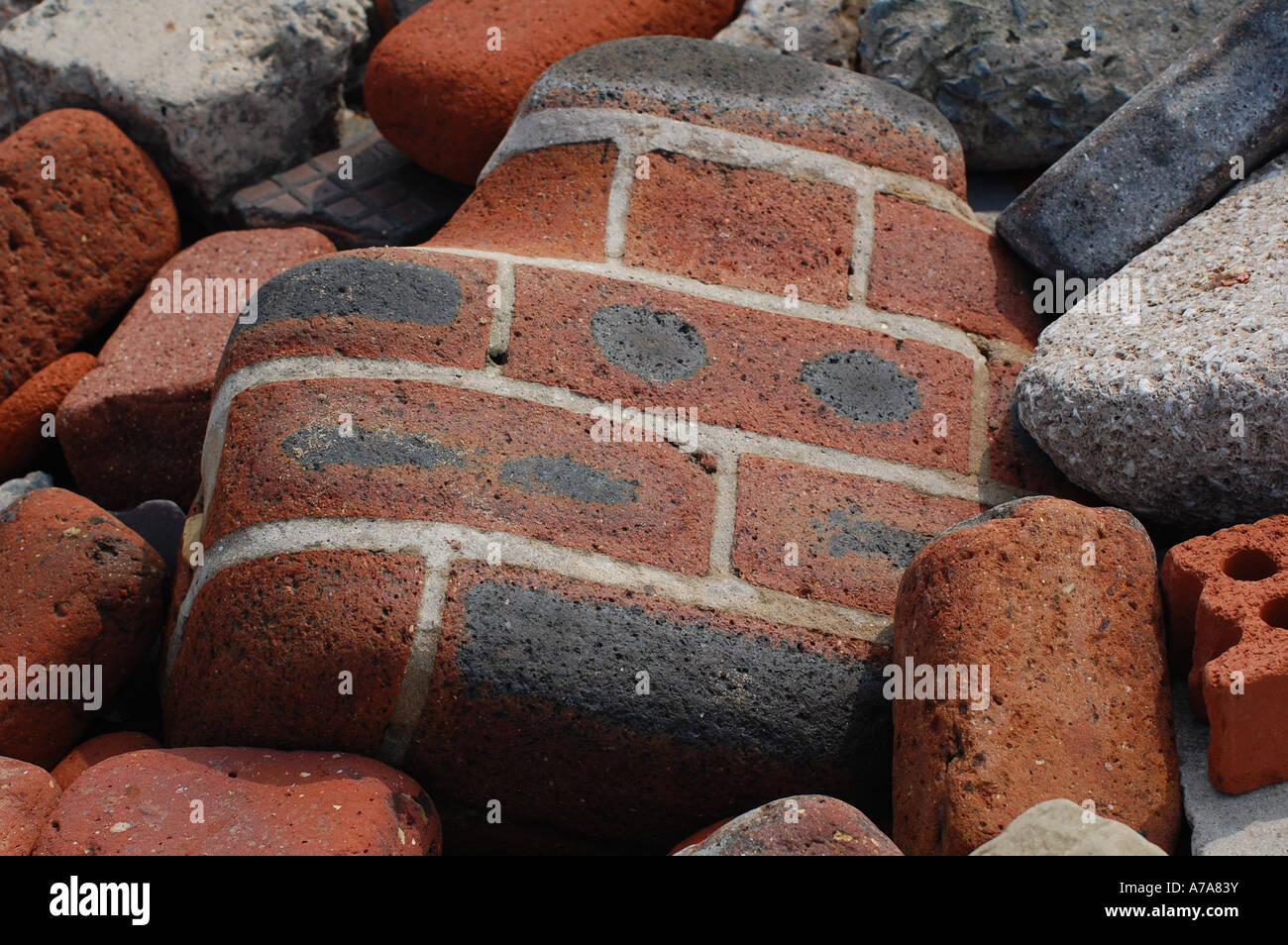 Weathered bricks from second world war damaged houses on Crosby Beach ...