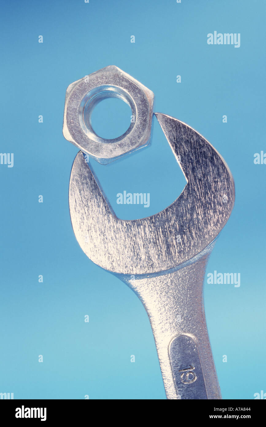Metal wrench and nut Stock Photo - Alamy