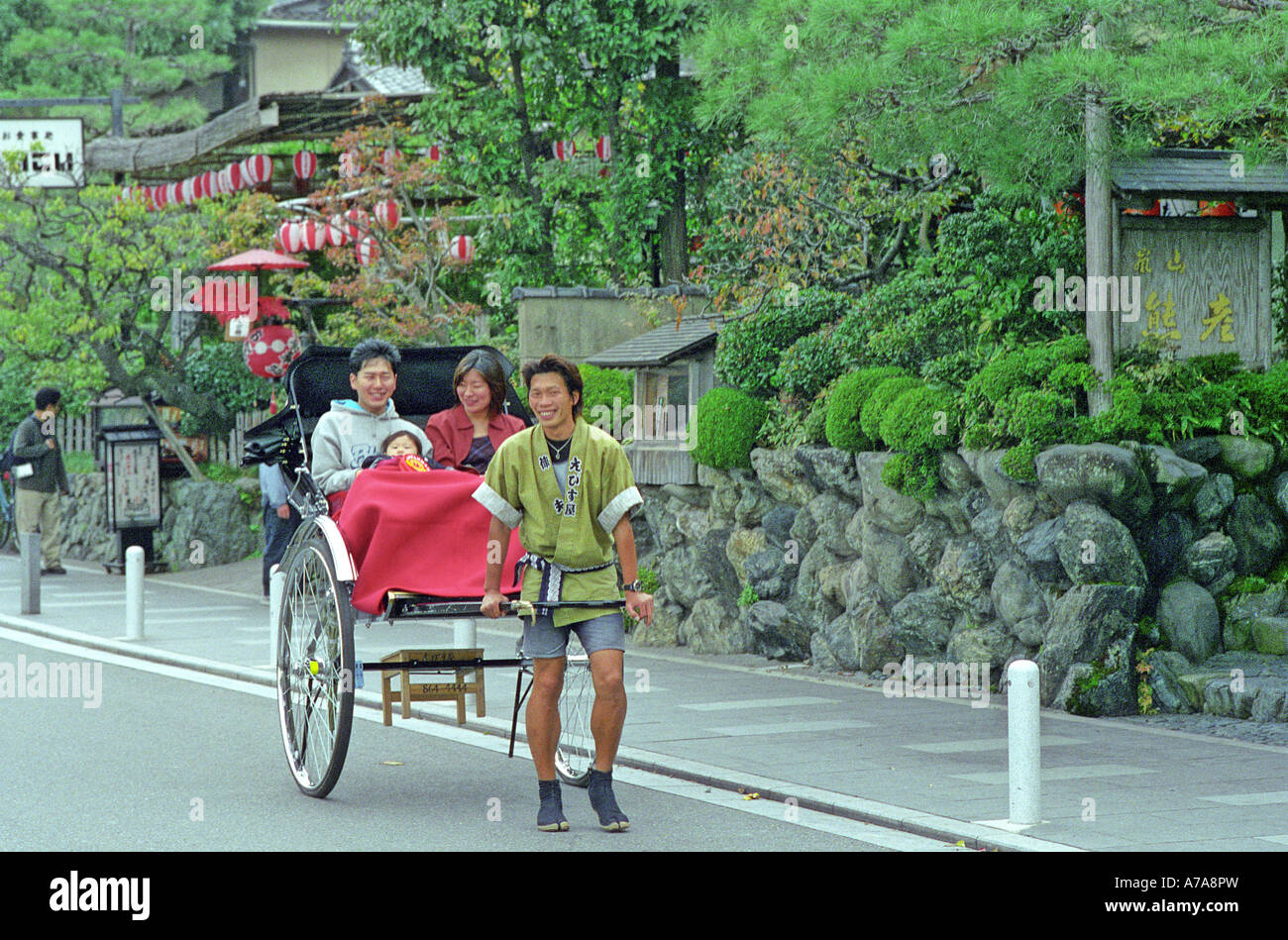 Rickshaw Driver and Family Stock Photo - Alamy