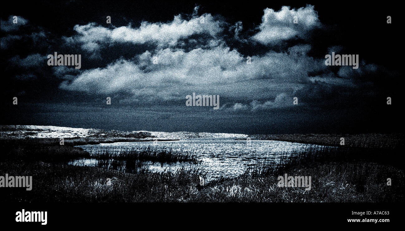Cloud pattern over marsh Stock Photo - Alamy