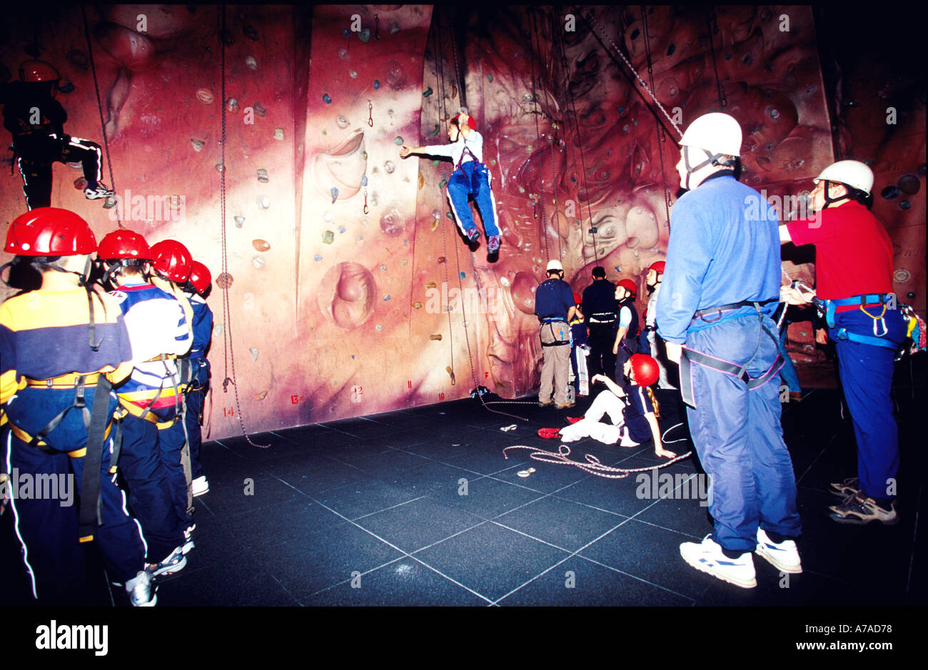 Kids Rock Climbing The Rope Centre Becon Wales uk Stock Photo - Alamy