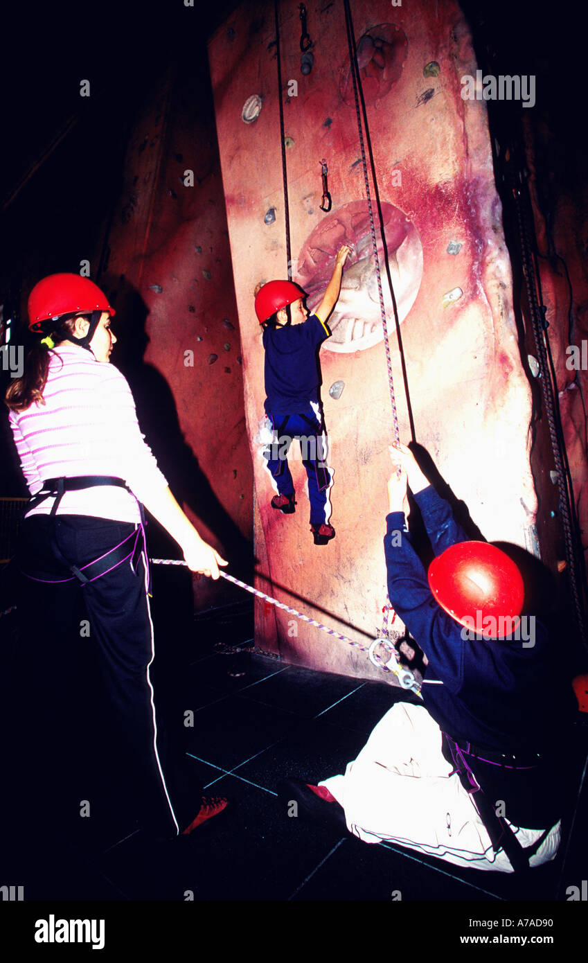 Boy Rock Climbing The Rope Centre Brecon Wales Stock Photo - Alamy